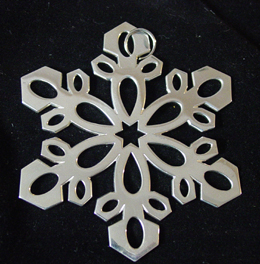 Sterling Collectables: Tiffany Snowflake w/ Star Center Sterling Ornament